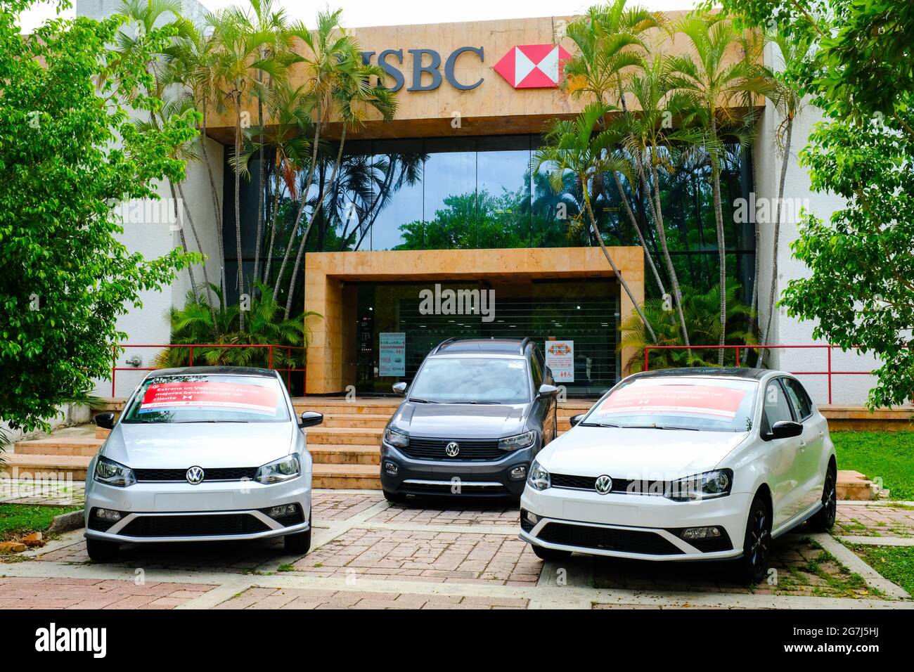 Cars to be won in front of HSBC Bank Merida Mexico Stock Photo - Alamy
