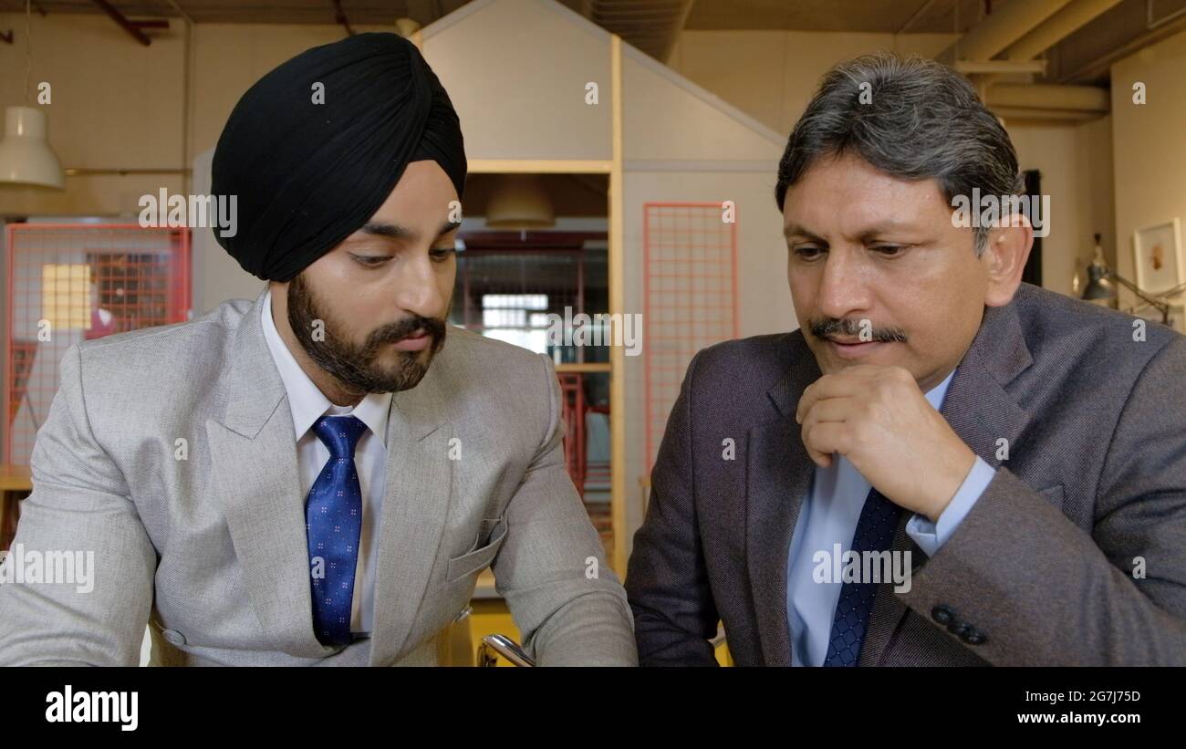 Closeup shot of Indian businessmen having a meeting Stock Photo - Alamy