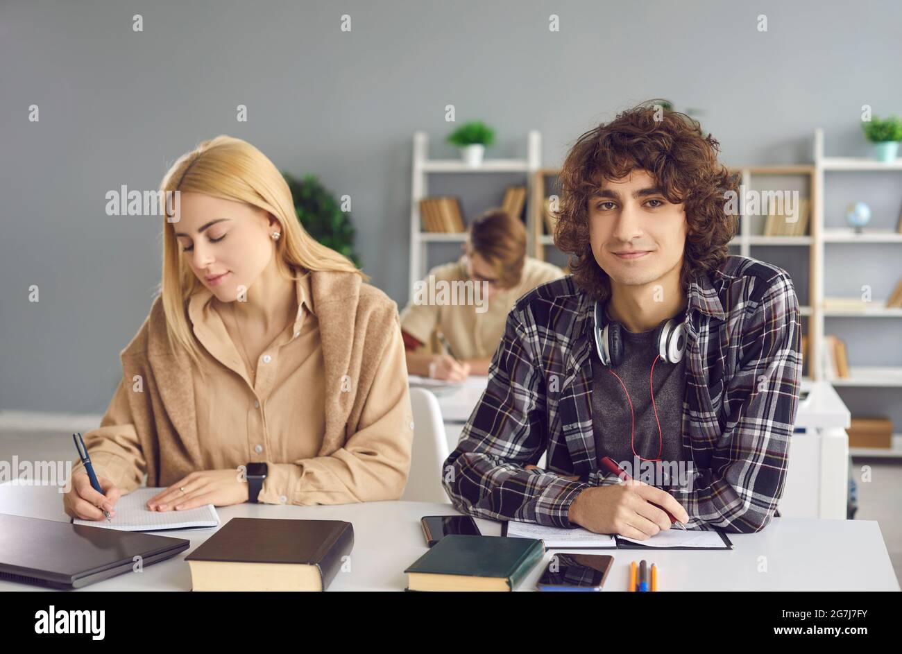 Female pupil studying in classroom hi-res stock photography and images ...