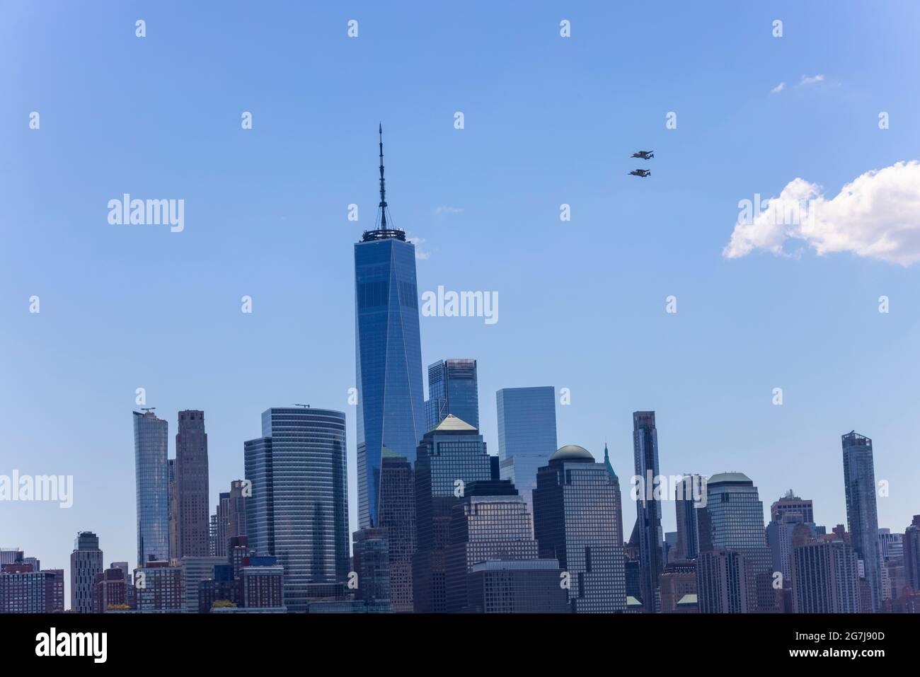 Maritime patrol aircrafts fly over the Lower Manhattan skyscraper in ...