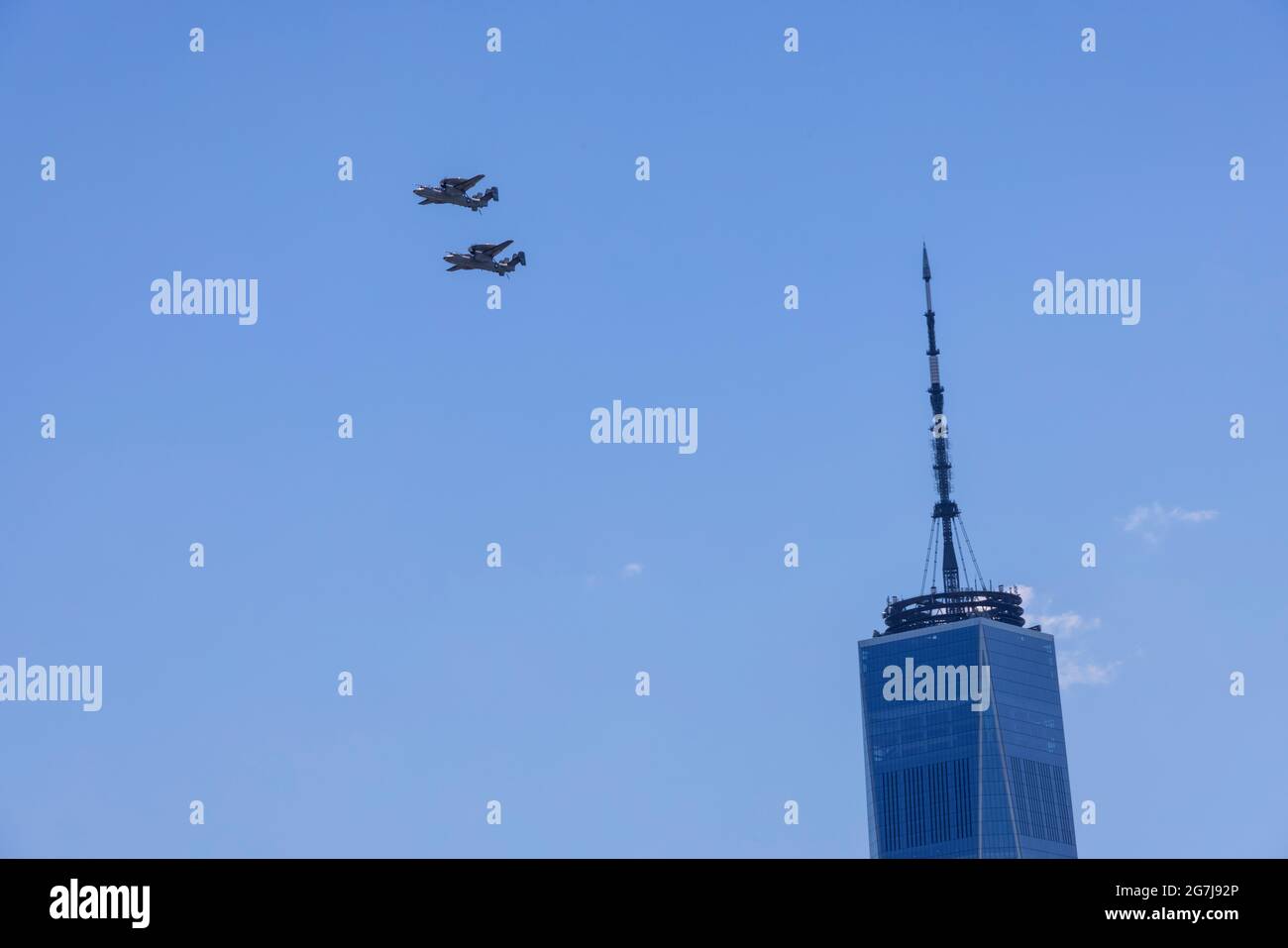 Maritime patrol aircrafts fly over the Lower Manhattan skyscraper in ...