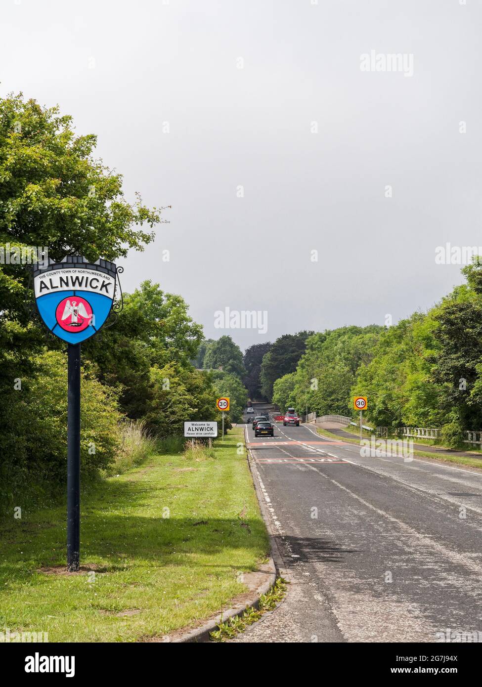 Alnwick signs on the road in to the market town in Northumberland, UK ...