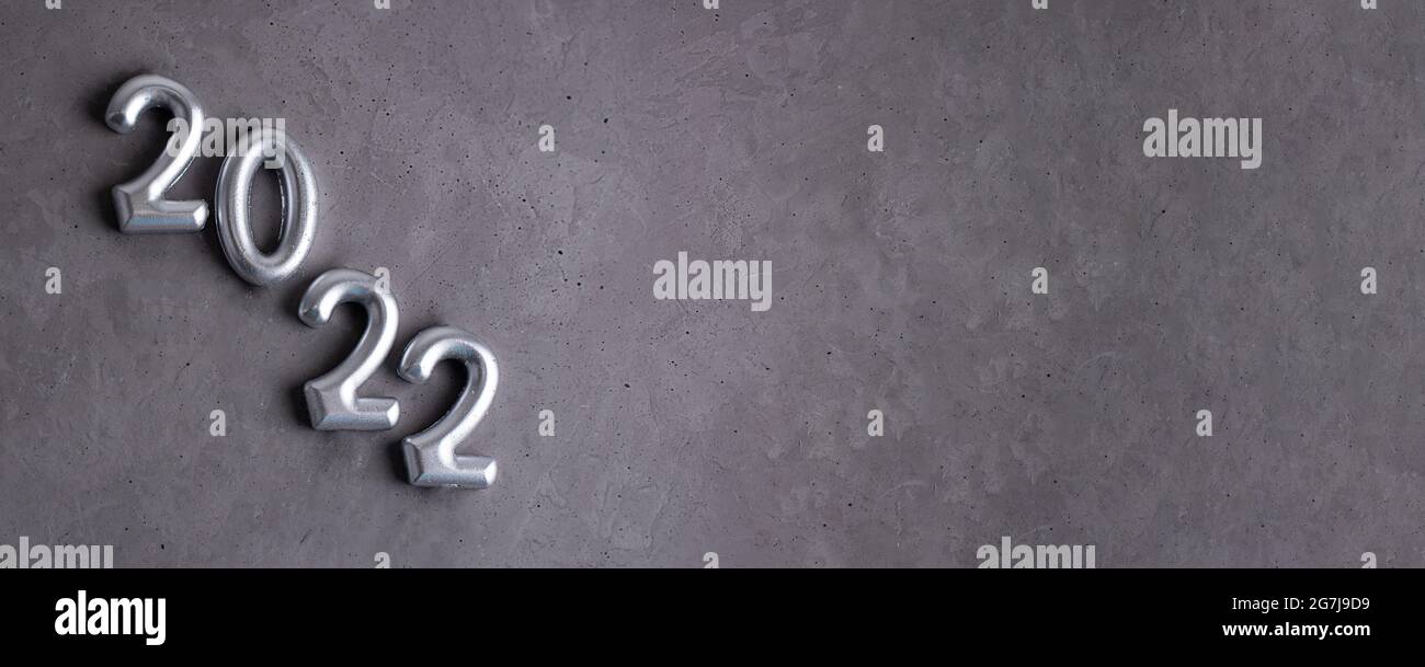 Silver numbers 2022 on gray concrete background, new year concept ...