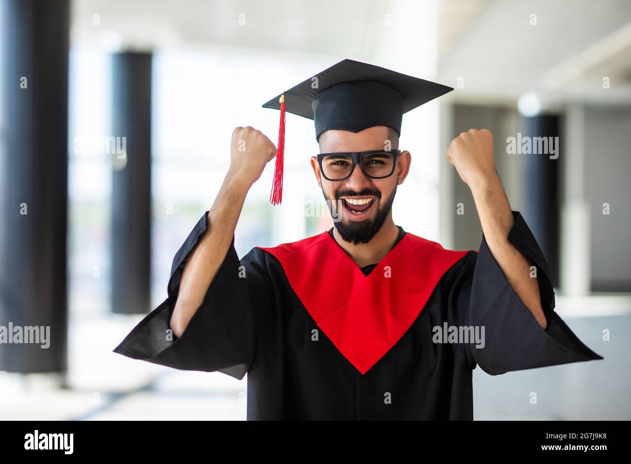 Happy graduation indian man celebrating at Uni Stock Photo - Alamy