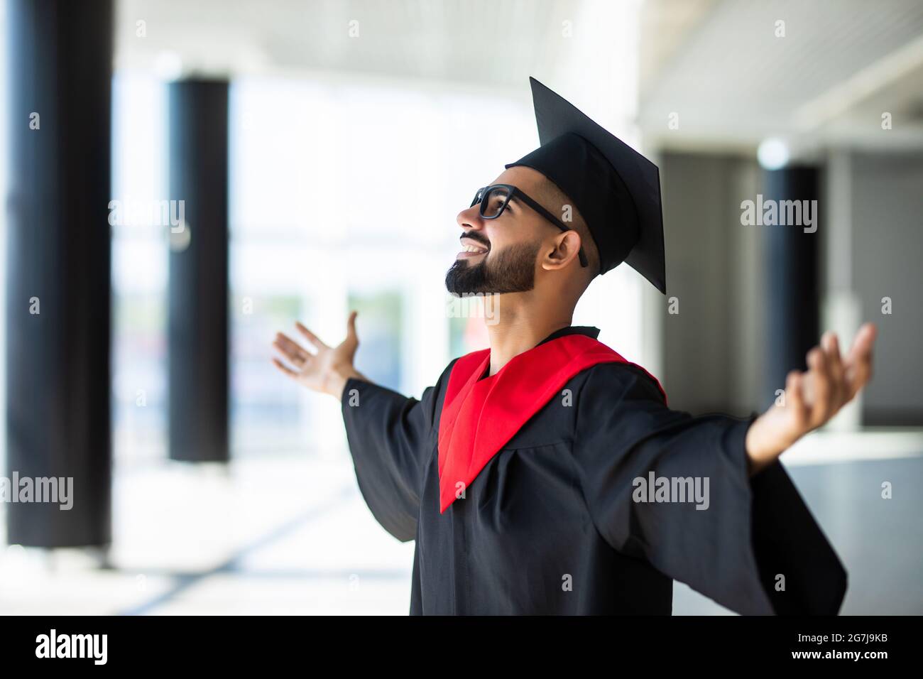 Happy graduation indian man celebrating at Uni Stock Photo - Alamy