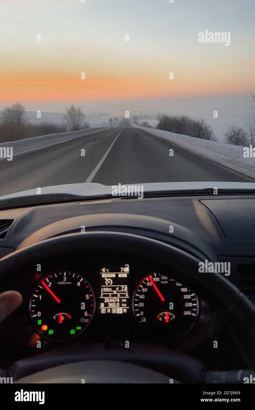 sunrise on the winter road copy space Stock Photo - Alamy