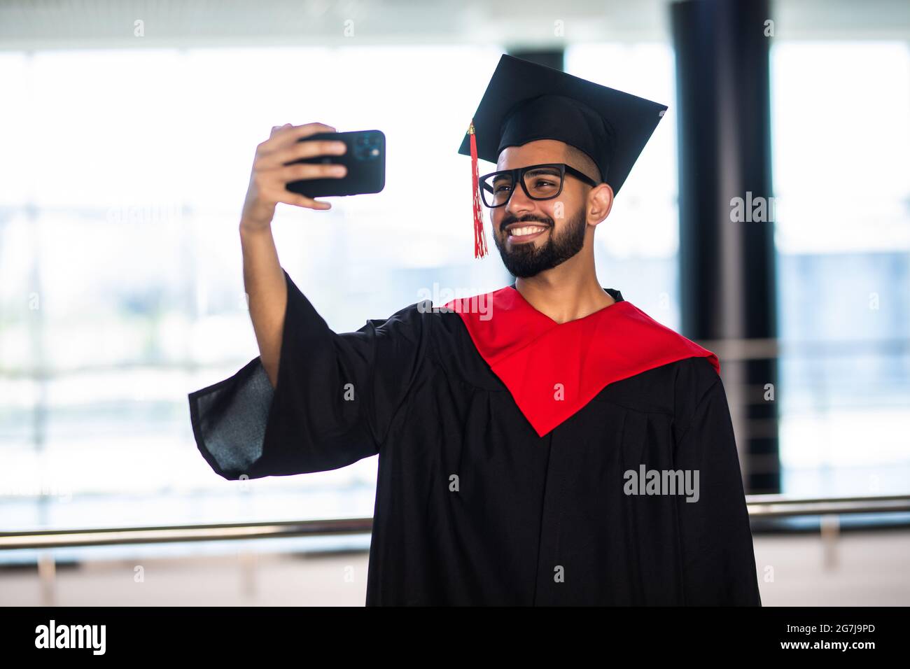 Highschool indian man graduate after graduation caremony Stock Photo ...