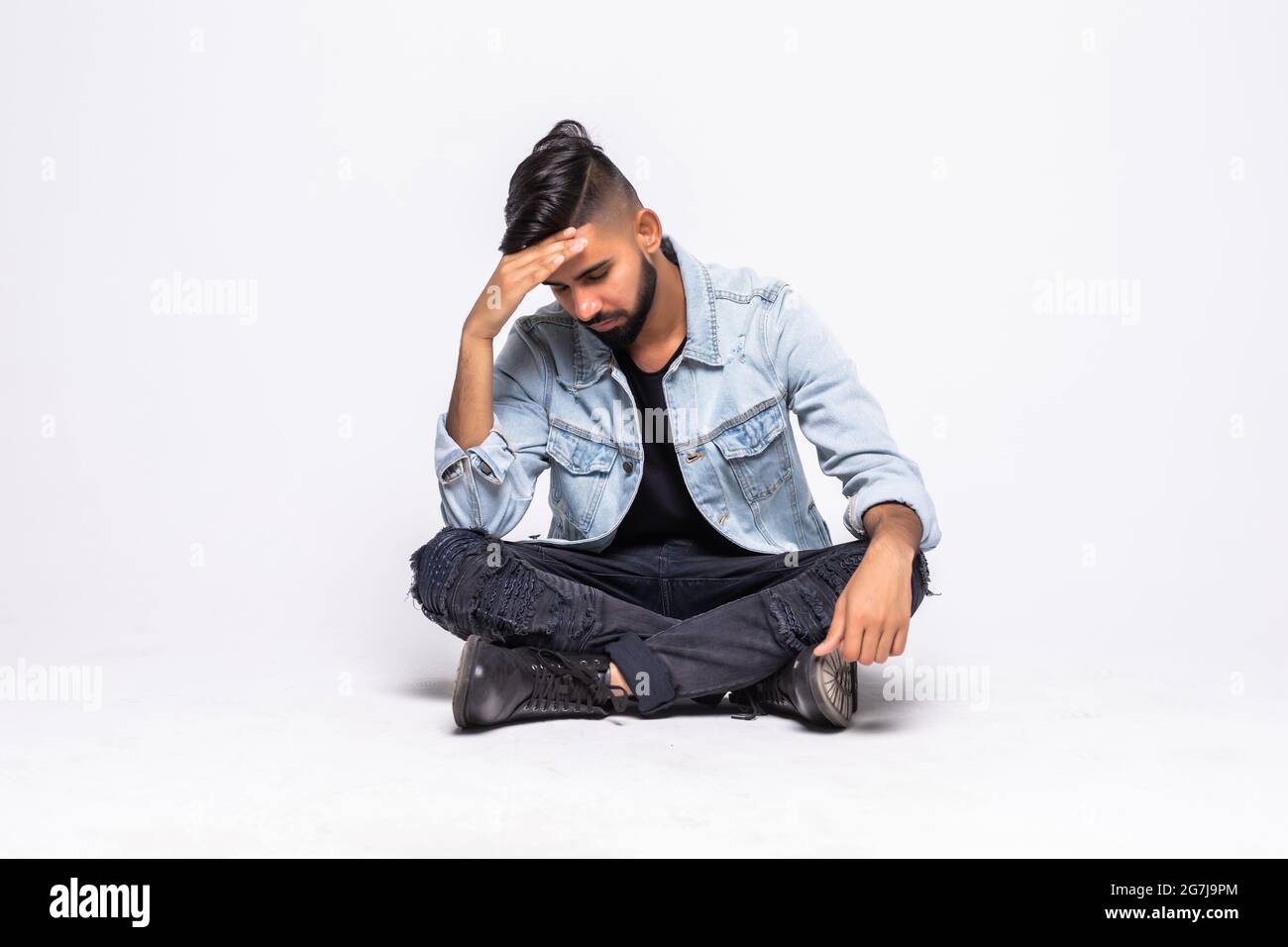 Young disappointed man isolated on white background Stock Photo - Alamy