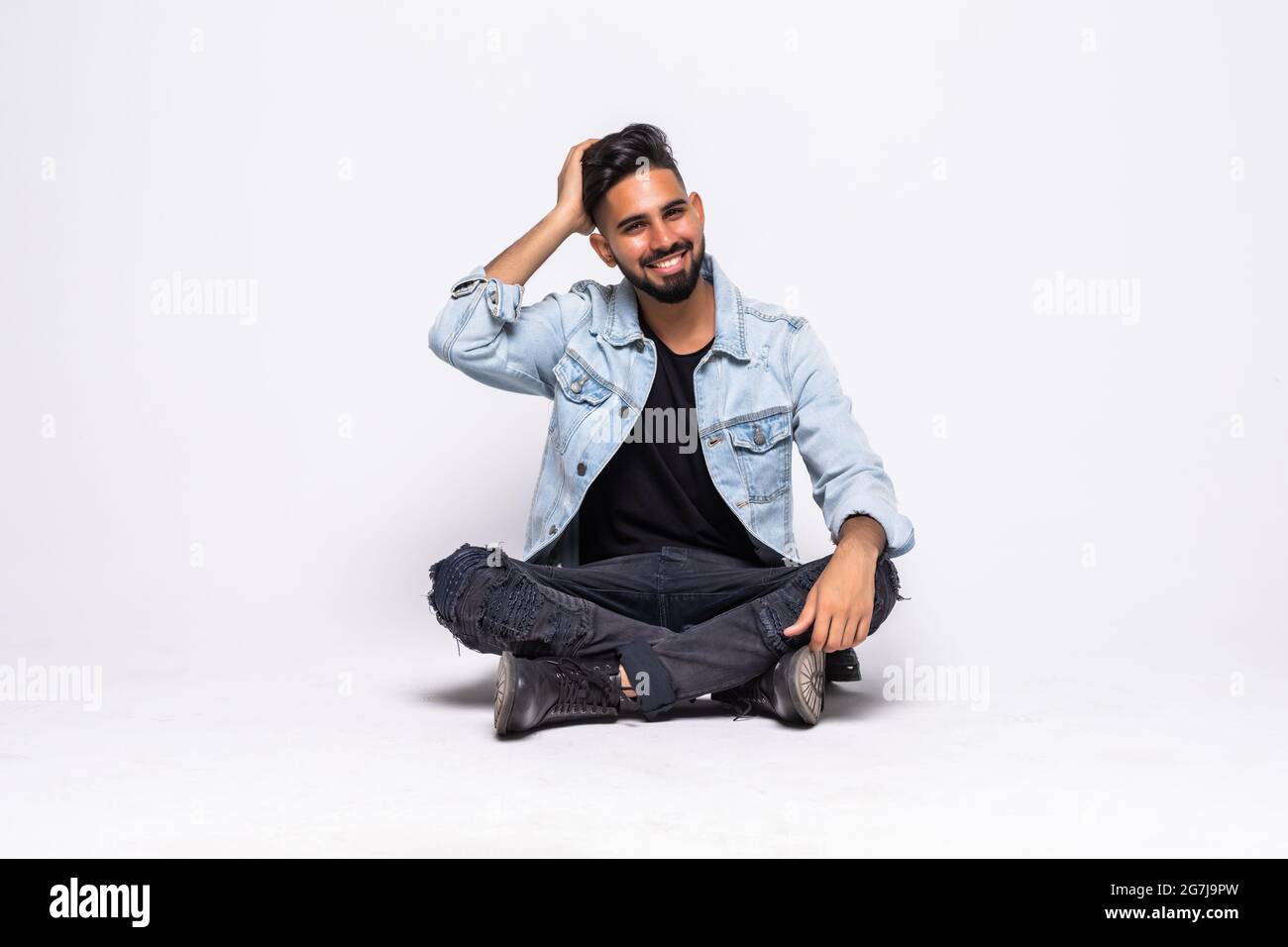Young disappointed man isolated on white background Stock Photo - Alamy