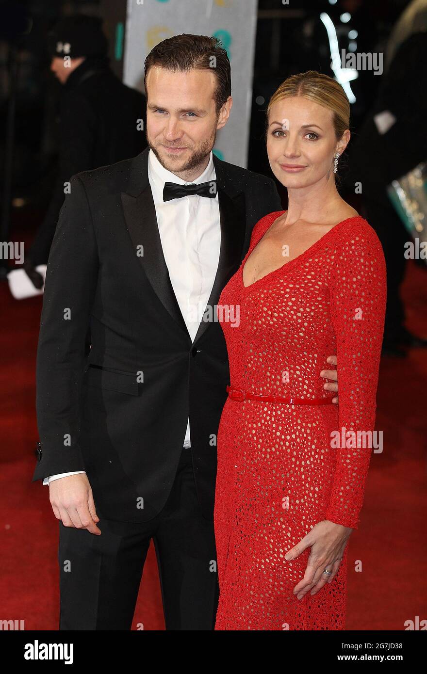 London. UK. Rafe Spall and Elize Du Toit at the EE British Academy Film ...