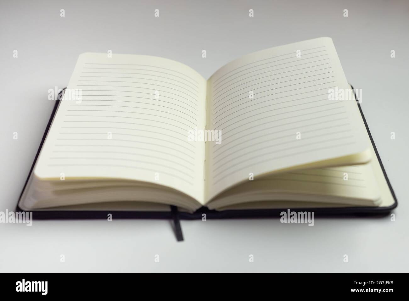 Opened notebook with empty white sheets with horizontal lines Stock ...