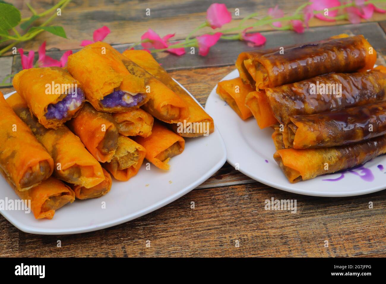 Vanilla custard filled spring rolls Stock Photo - Alamy