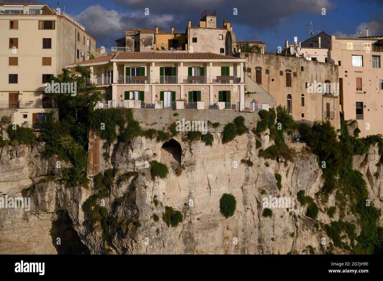 Tropea, Italy. 11th July, 2021. A cliff with houses built on the edges ...