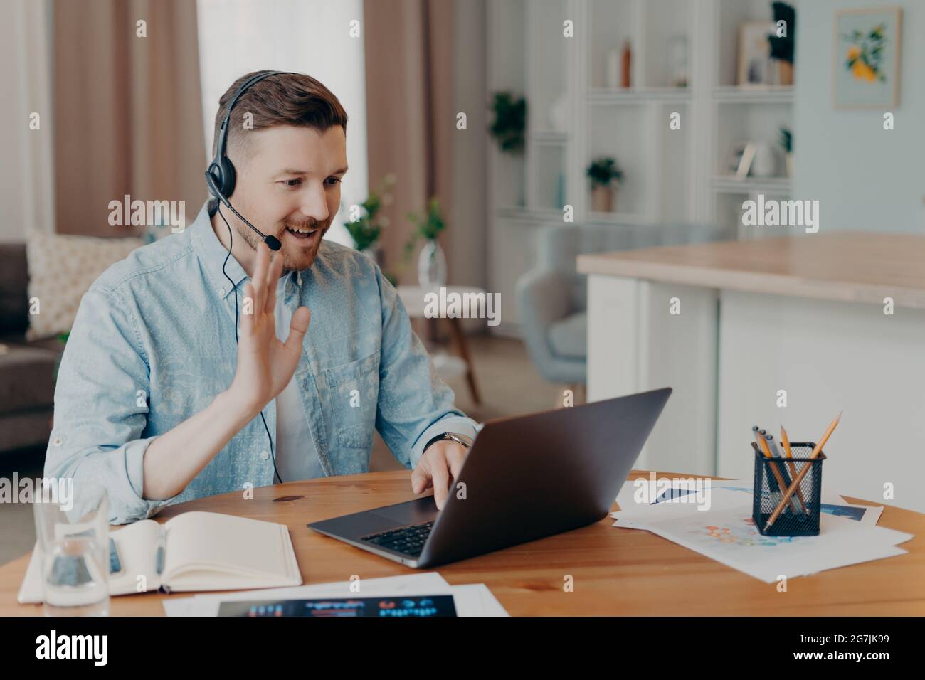 Office man waving hand hi-res stock photography and images - Alamy