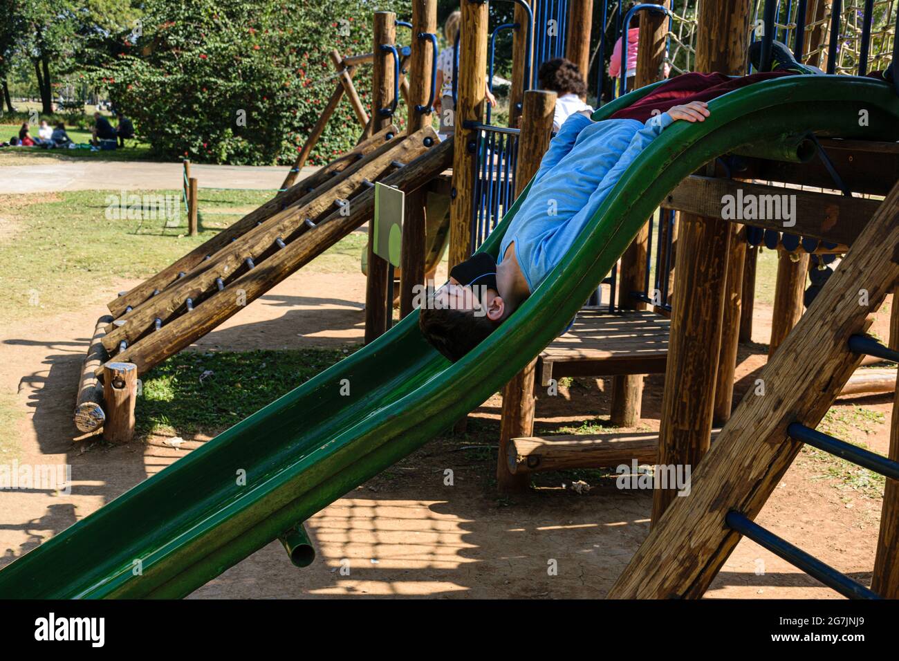 Going down the slide hi-res stock photography and images - Alamy