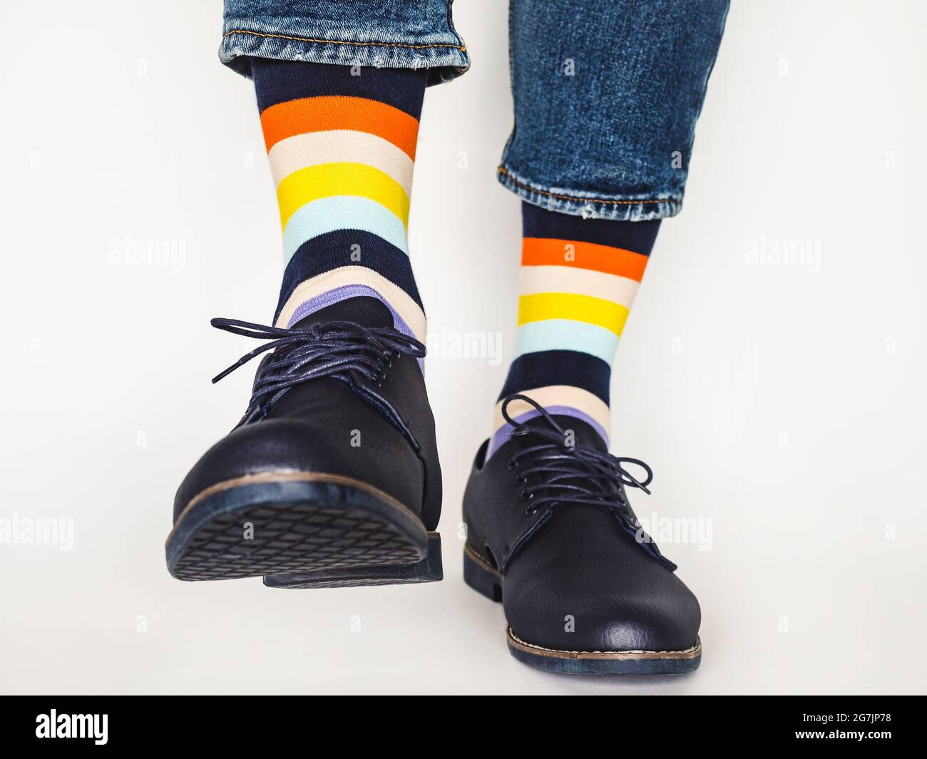 Men's legs, trendy shoes and bright socks. Close-up. Style, beauty and ...