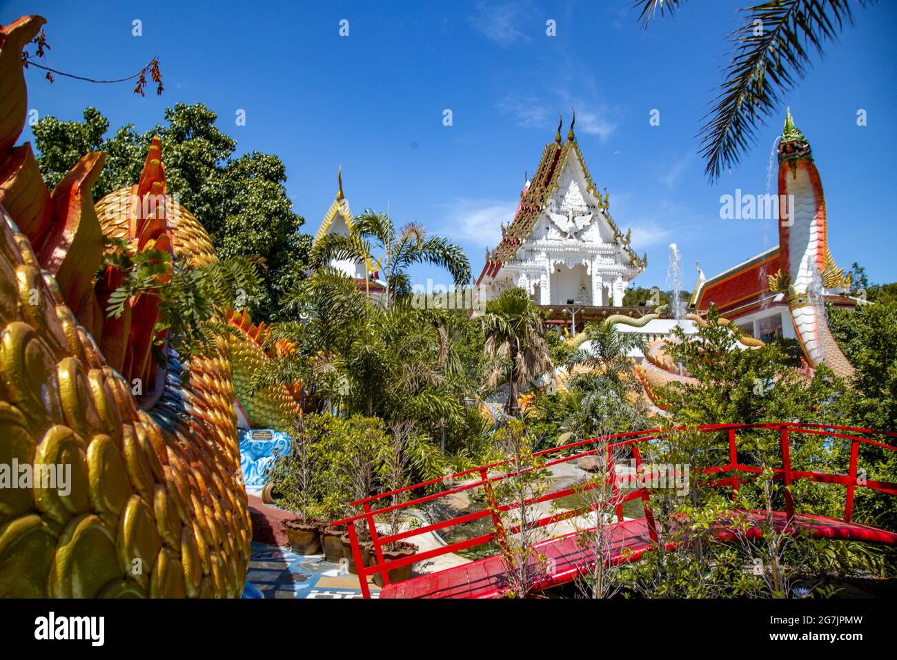 Wat Khao Sung Chaem Fa temple with giant snake and reclining gold ...
