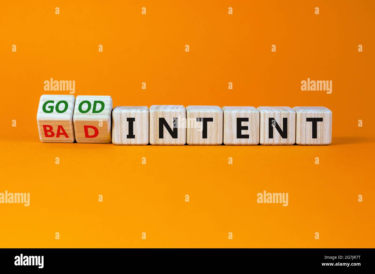 Good or bad intent symbol. Turned wooden cubes, changed words 'bad ...