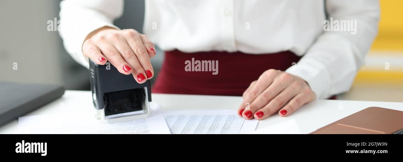 Businesswoman stamping hi-res stock photography and images - Alamy