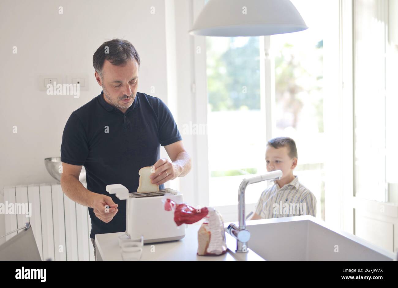 Boy making sandwich hi-res stock photography and images - Alamy