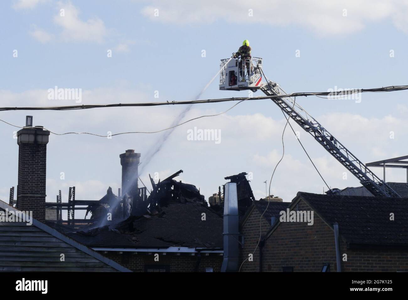Fire burning through roof hi-res stock photography and images - Alamy