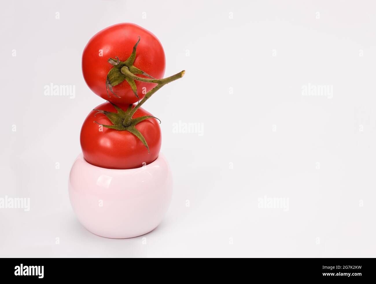 Two half cut tomato tomatoes hi-res stock photography and images - Alamy