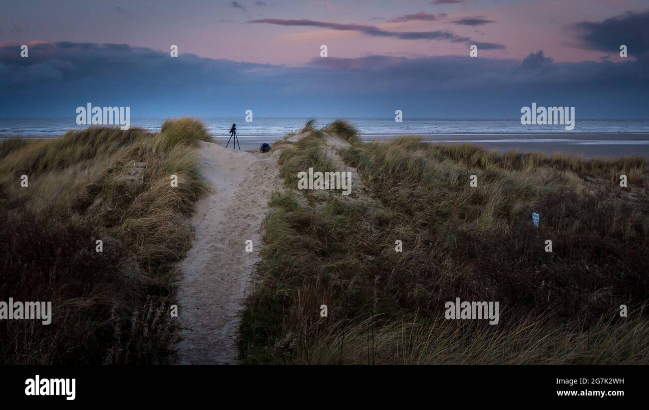 Aerial view of a steep path leading to the peak of the hill with ...
