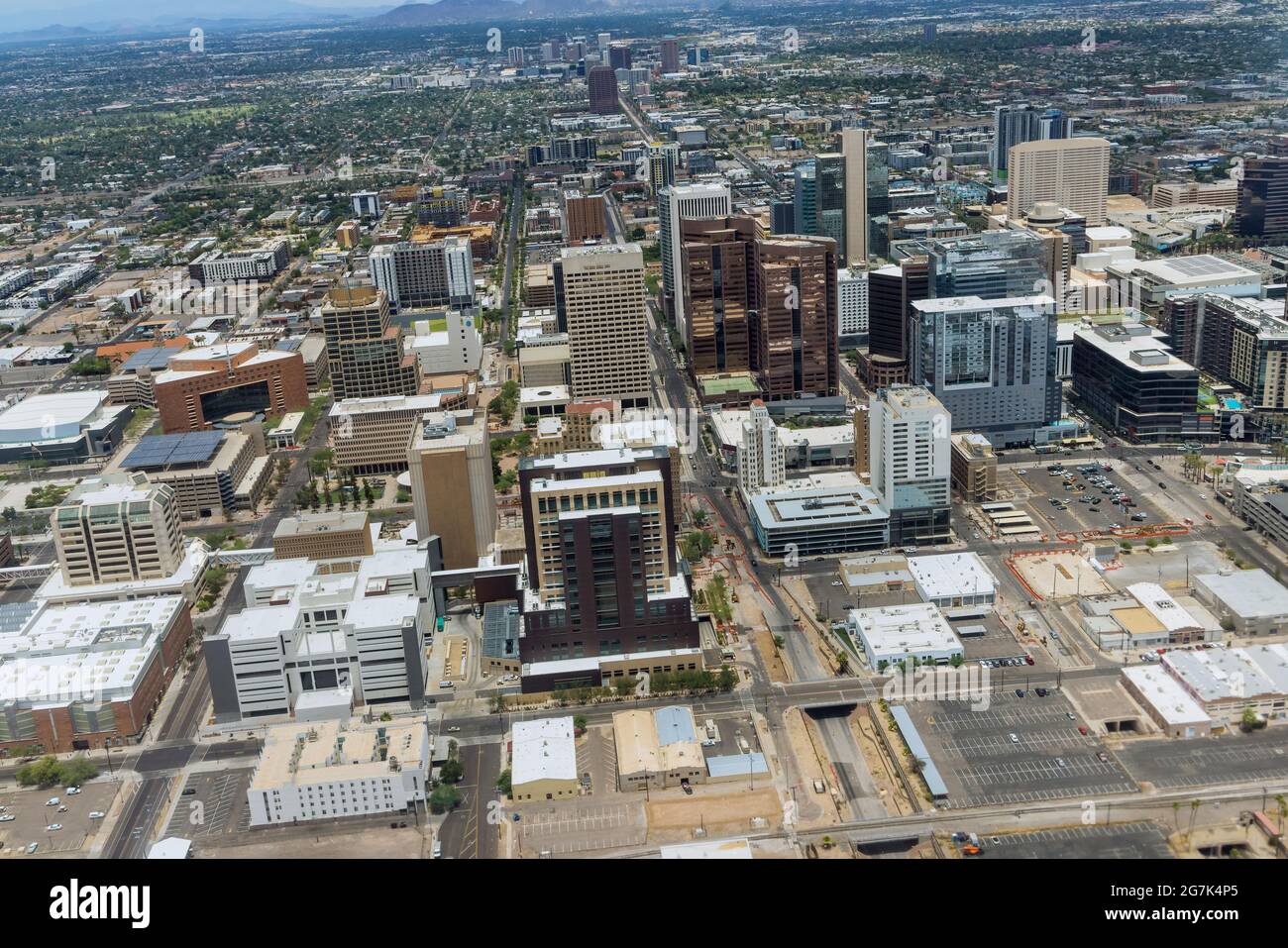 Aerial view of the growth of downtown Phoenix Arizona looking west in ...