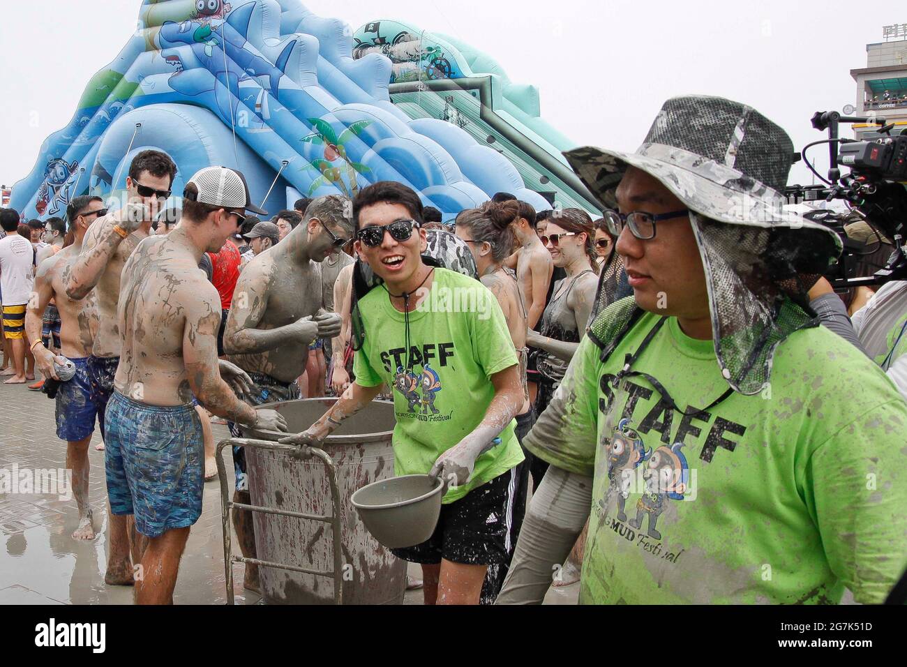 July 15, 2021-Boryeong, South Korea-A Visitors enjoying wrestle in the ...