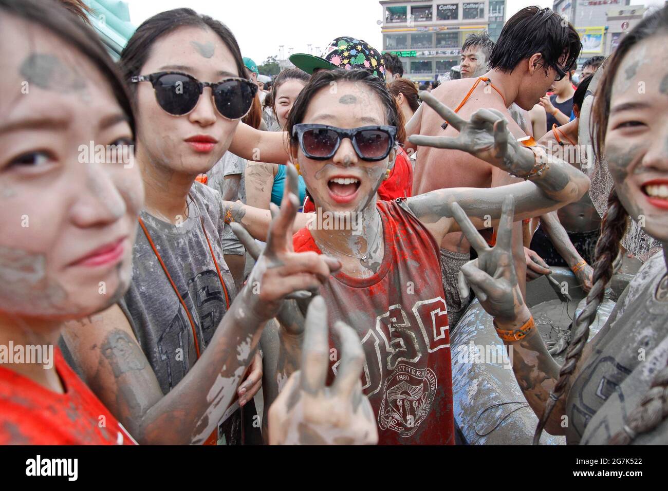 July 15, 2021-Boryeong, South Korea-A Visitors enjoying wrestle in the ...