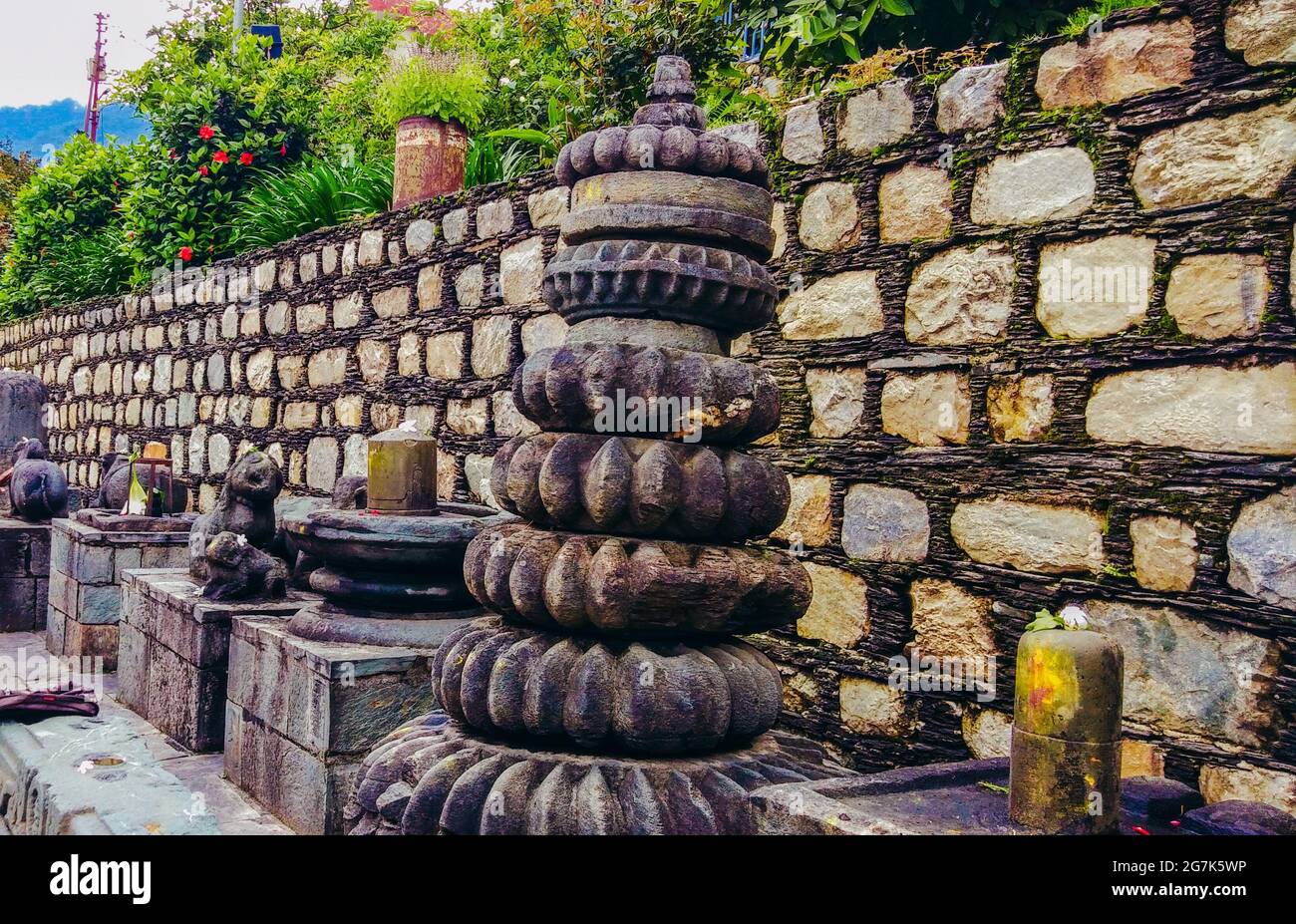 Horizontal of a tiled old fence with superb sculptured objects of an ...