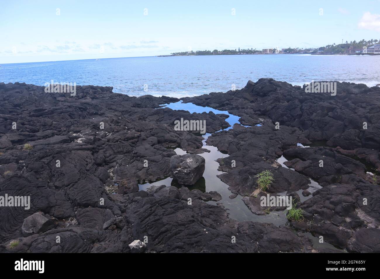 Oceanside landscape of black volcanic rock on the island of Kona ...