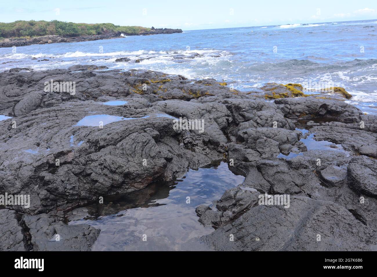 Oceanside landscape of black volcanic rock on the island of Kona ...