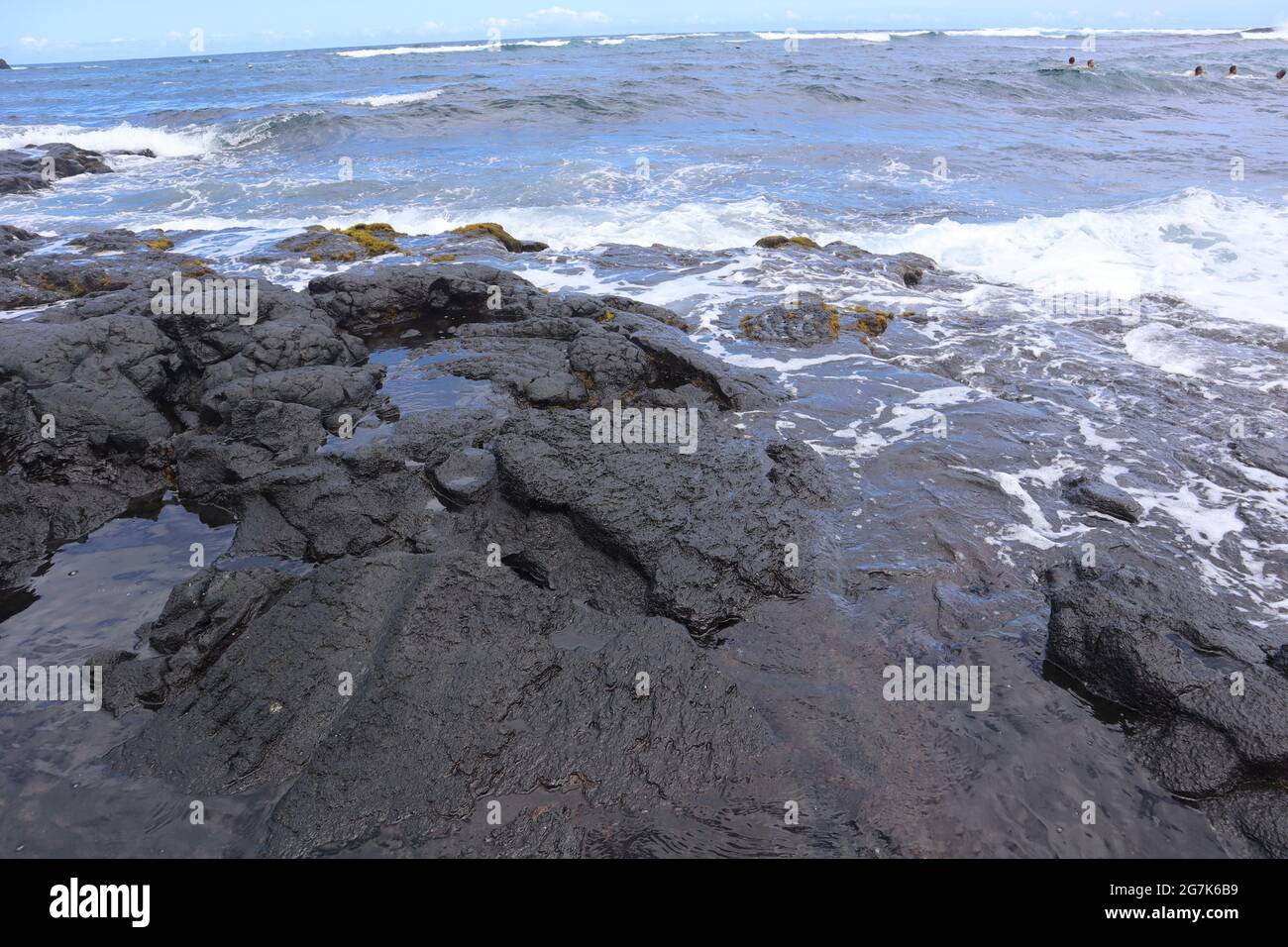 Oceanside landscape of black volcanic rock on the island of Kona ...