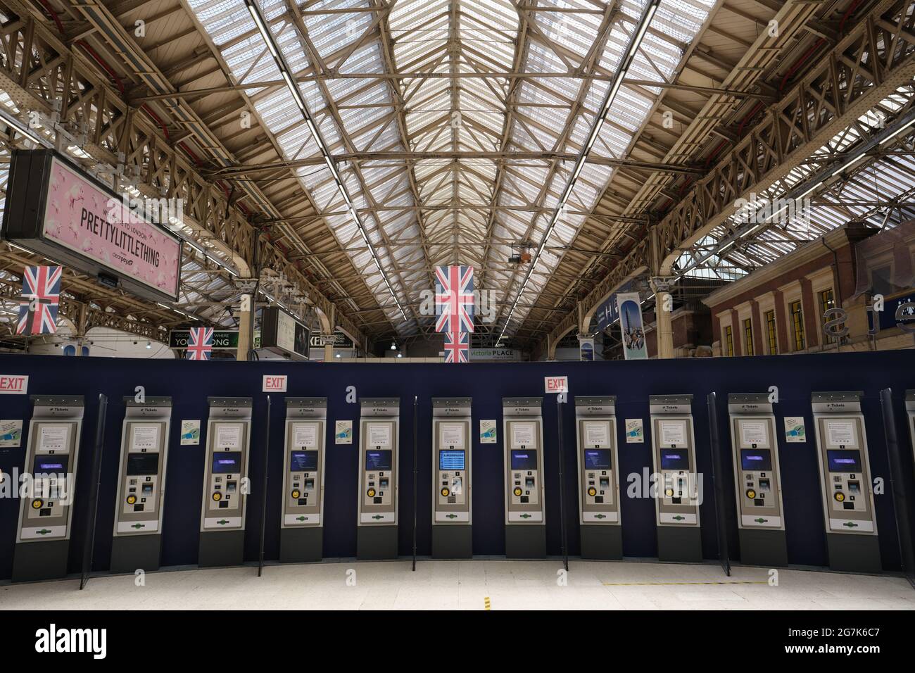A row of empty automated ticket issuing machines at Victoria national ...