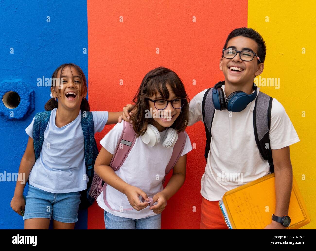 Children with backpacks hi-res stock photography and images - Alamy