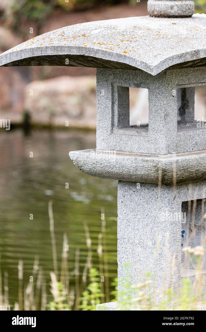 Closeup shot of a Japanese stone lantern Stock Photo - Alamy