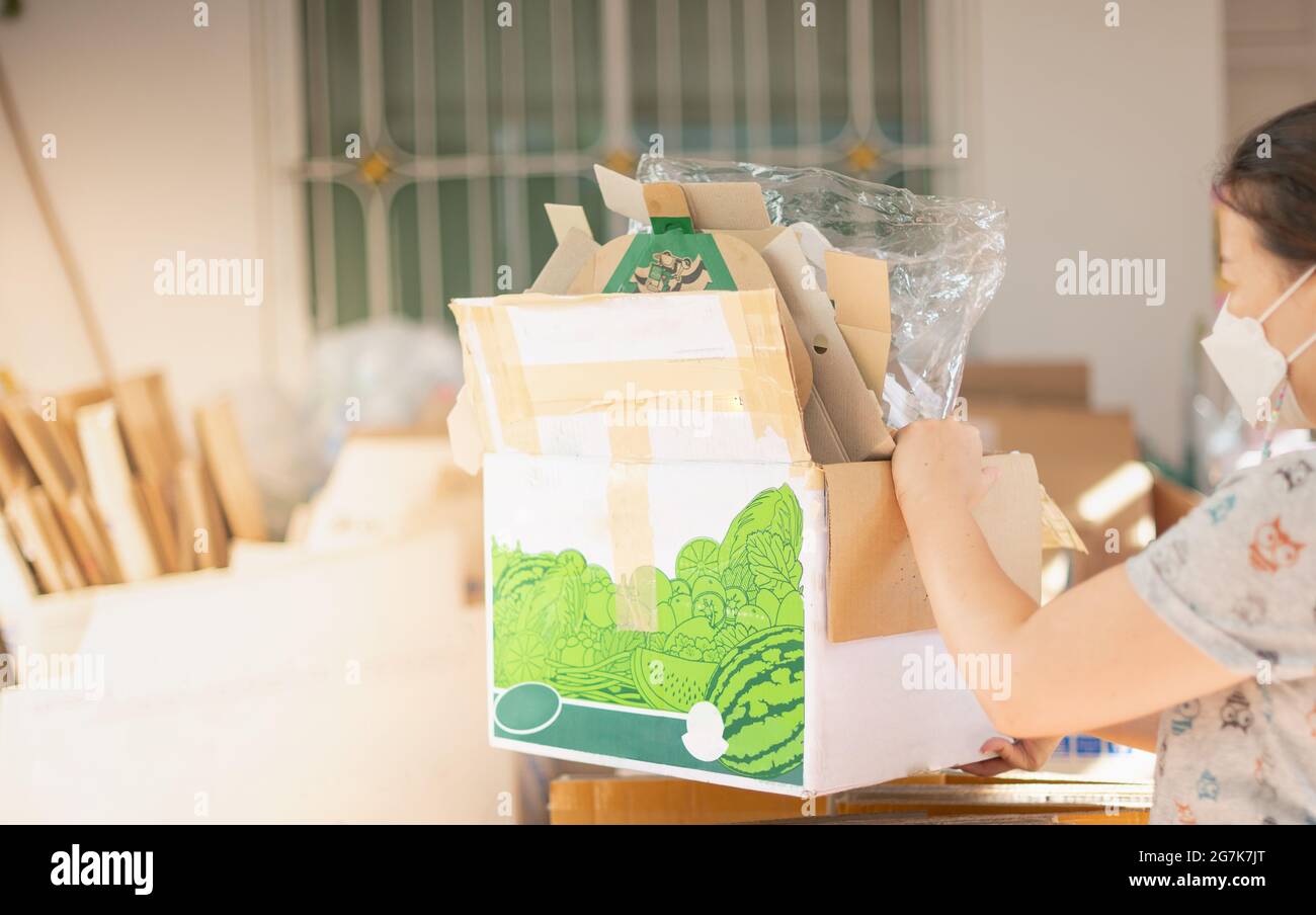 Compressed corrugated boxes hi-res stock photography and images - Alamy