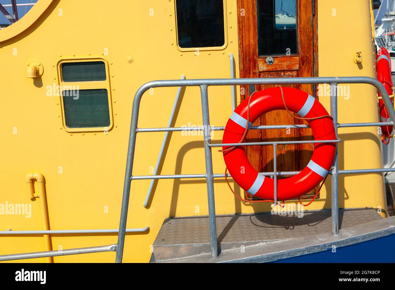Lifebuoy on board the ship . Red Lifebuoy Stock Photo - Alamy