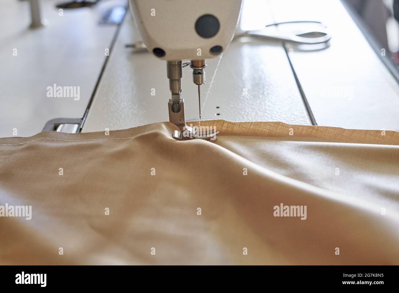 Closeup shot of a sewing process in the phase of overstitching Stock ...