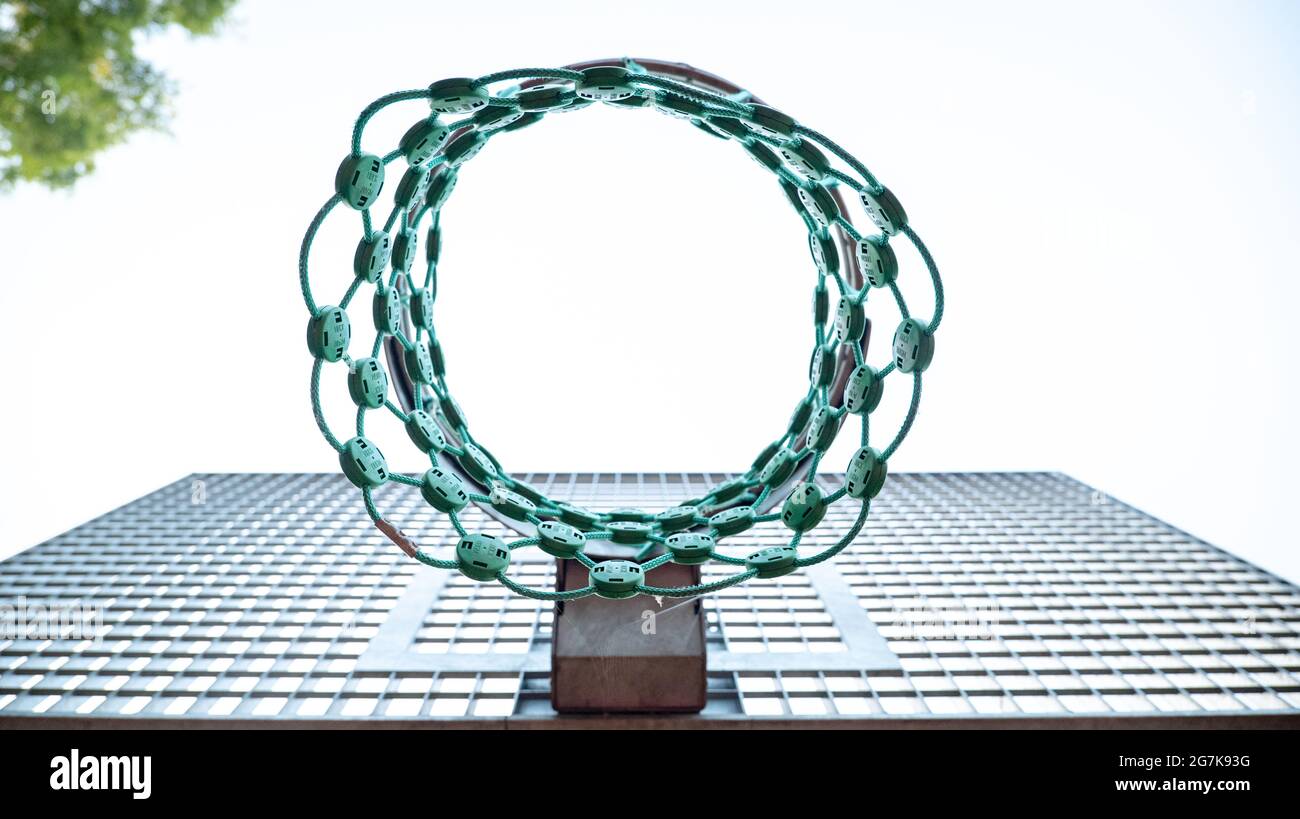 Low angle shot of a basketball hoop on a gloomy day Stock Photo - Alamy