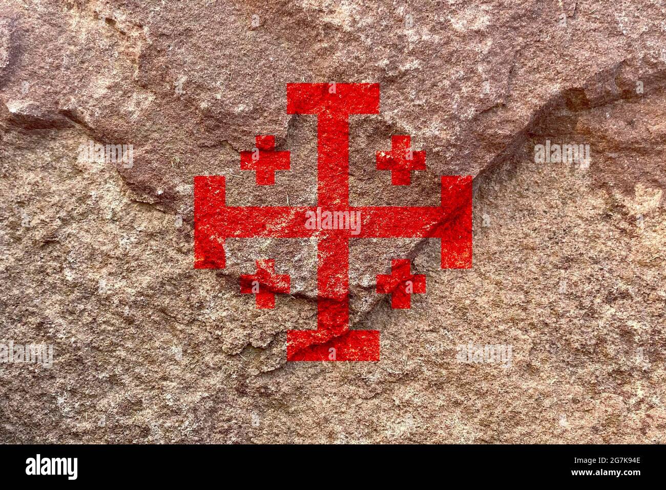 Red Holy Sepulchre Cross on weathered solid rock wall background Stock ...