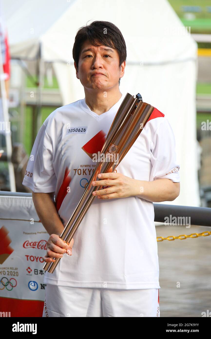 Fuchu City, Japan, 14th July 2021. Torchbearer, Cramming teacher, Osamu ...