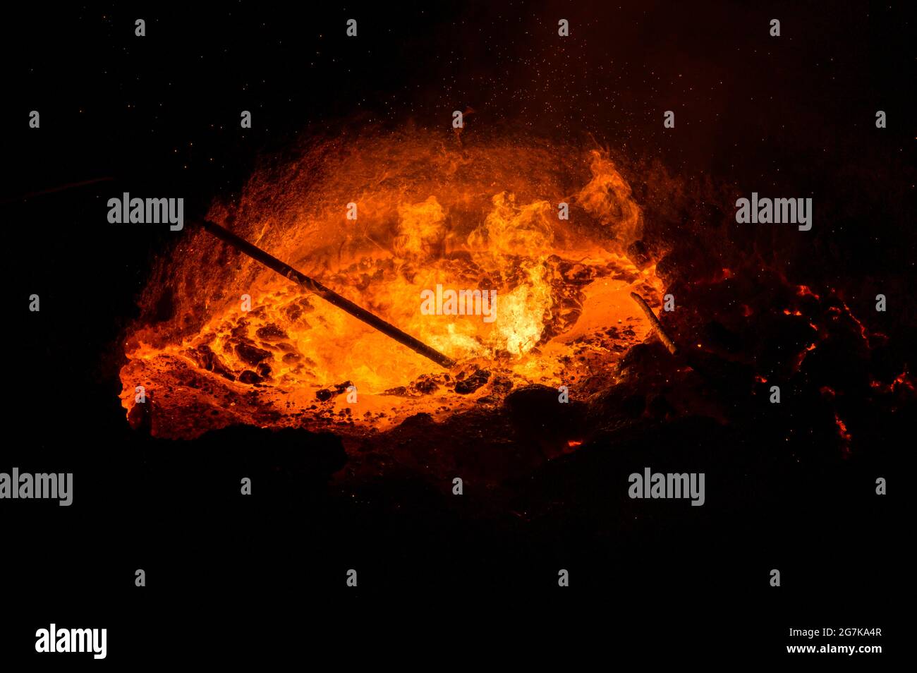 process of taking a sample of liquid metal in a steelmaking furnace ...