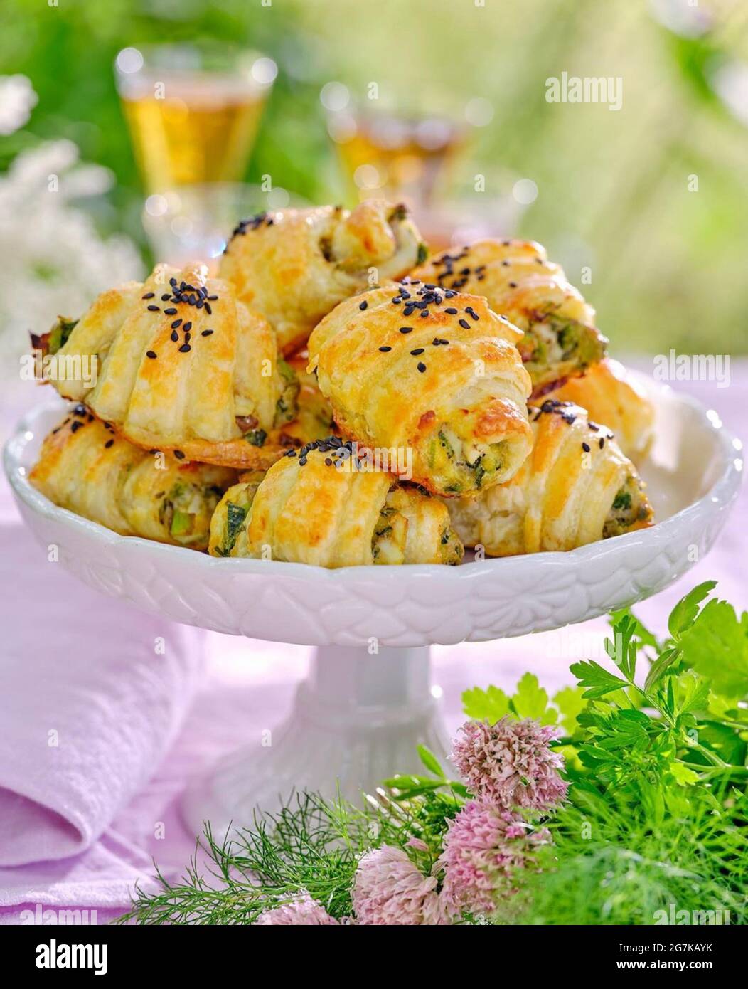 Appetizing stuffed croissants on a decorated dinner table Stock Photo ...