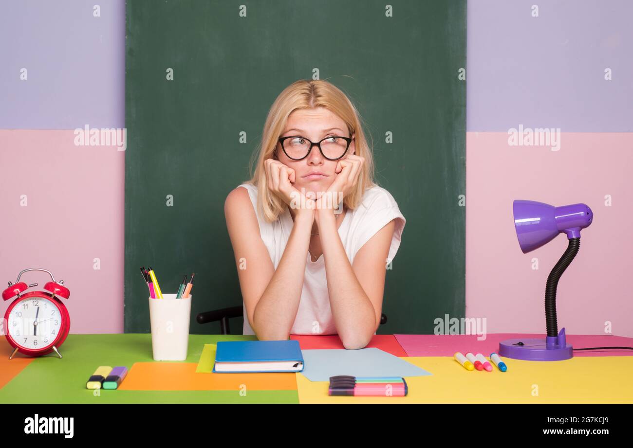 Education, school and people concept. Happy smiling young student or ...