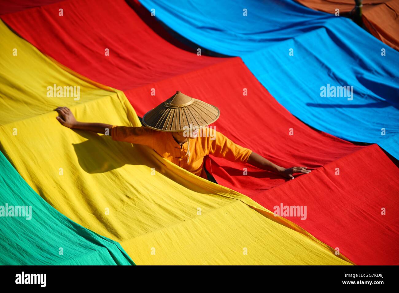 Colorful clothes in Inle lake Myanmar Stock Photo - Alamy