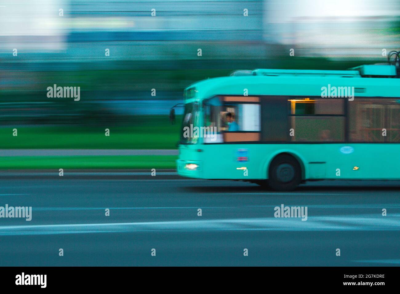 Closeup shot of a fast-moving bus in a street Stock Photo - Alamy
