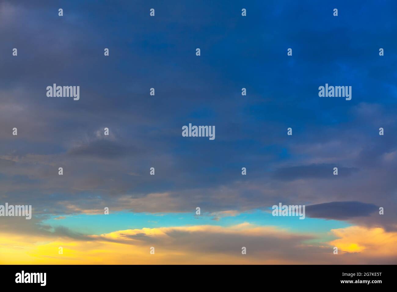 Sky background with colorful clouds . Evening light Stock Photo - Alamy