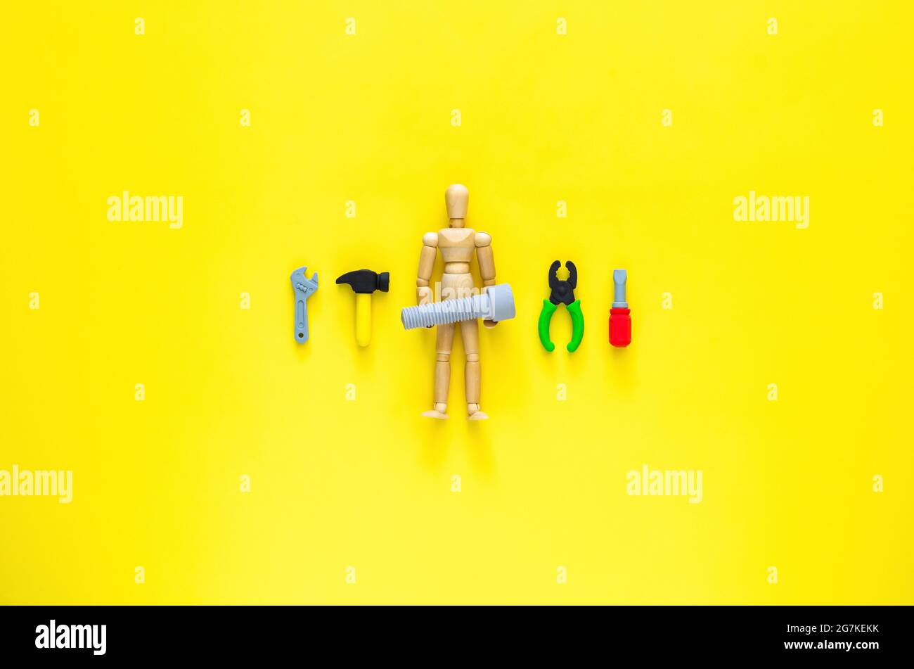 Wooden model with tools and equipment for work in construction. Minimal ...